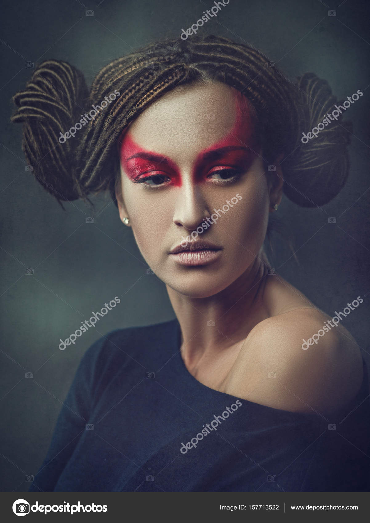 Female portrait with incredible makeup Stock Photo by ©tolokonov 157713522