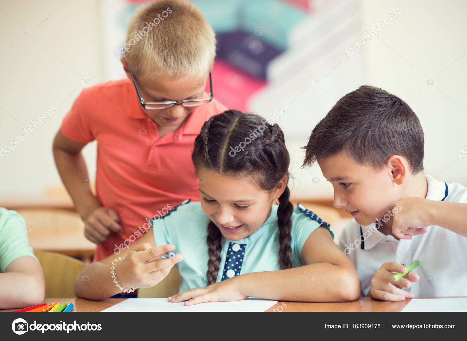 Group of school children learning at klassroom in school — Stock Photo ...