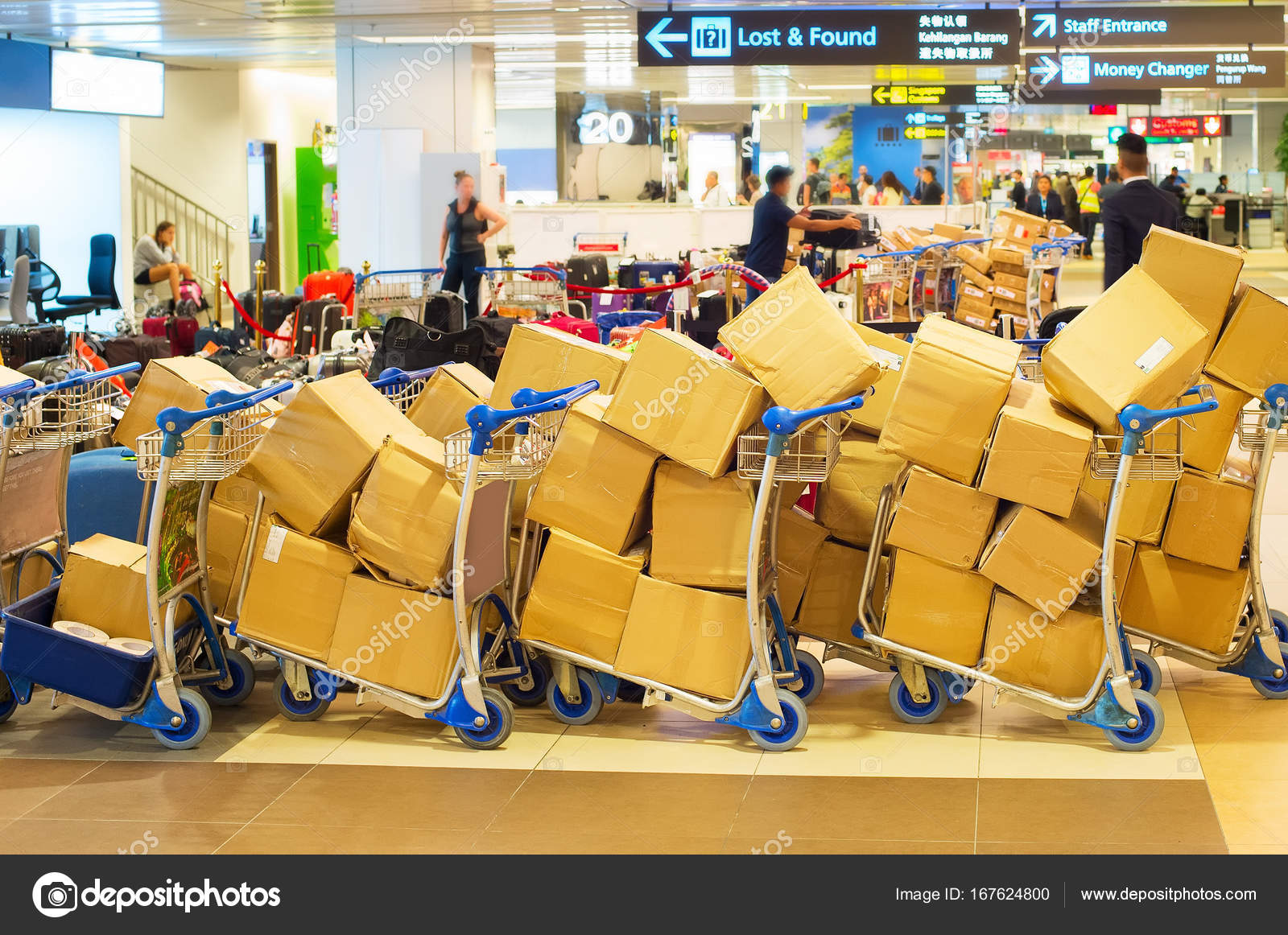 Lots of cardboard boxes on a trolleys — Stock Photo © joyfull #167624800