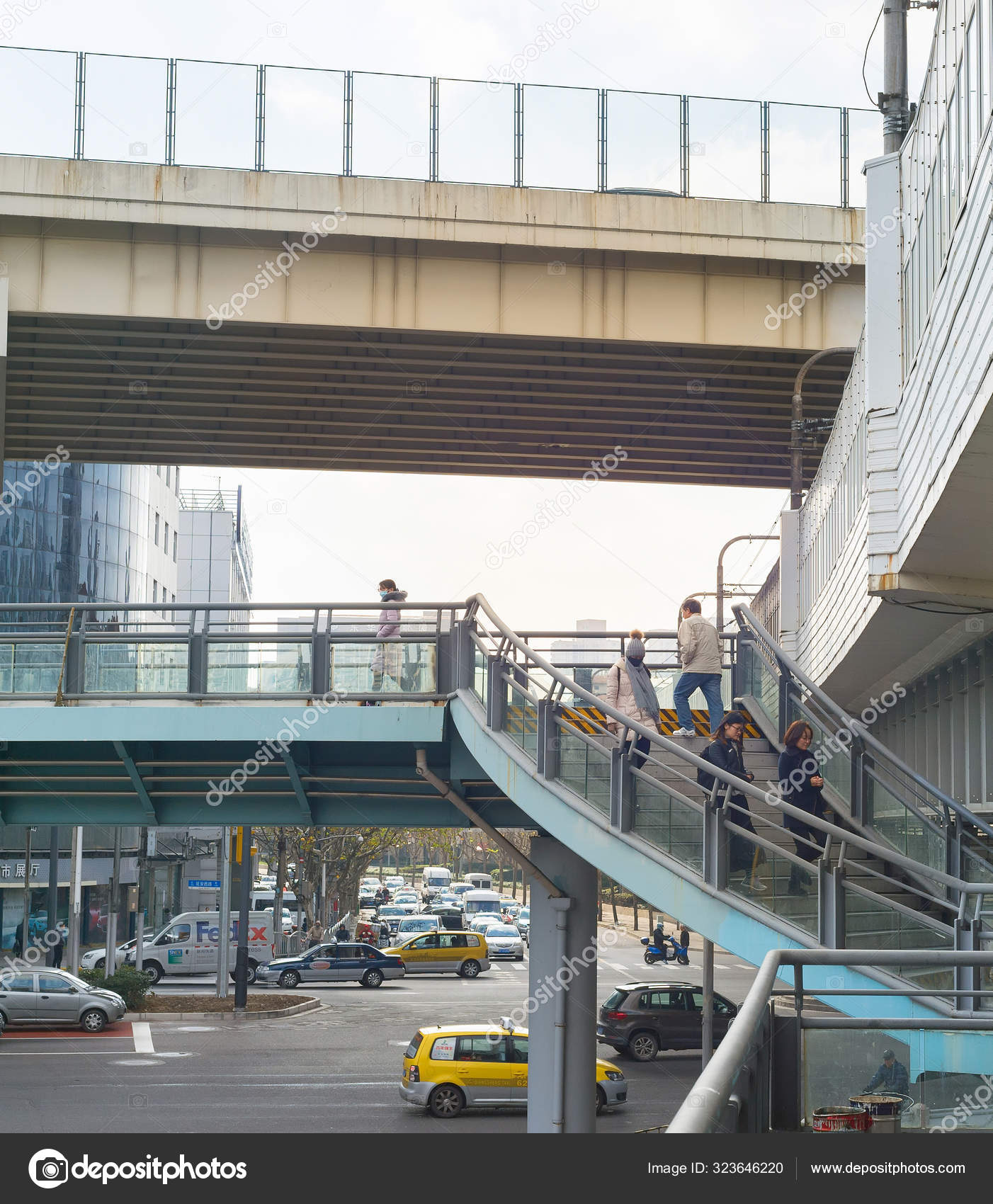 People crossing road bridge Shanghai — Stock Editorial Photo © joyfull ...