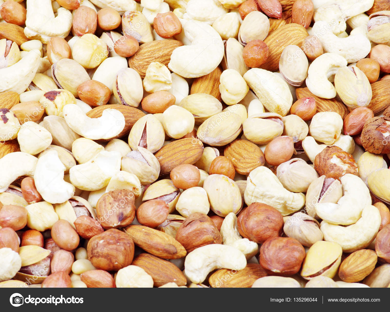 Nuts mixed for background Stock Photo by ©Pakhnyushchyy 135296044