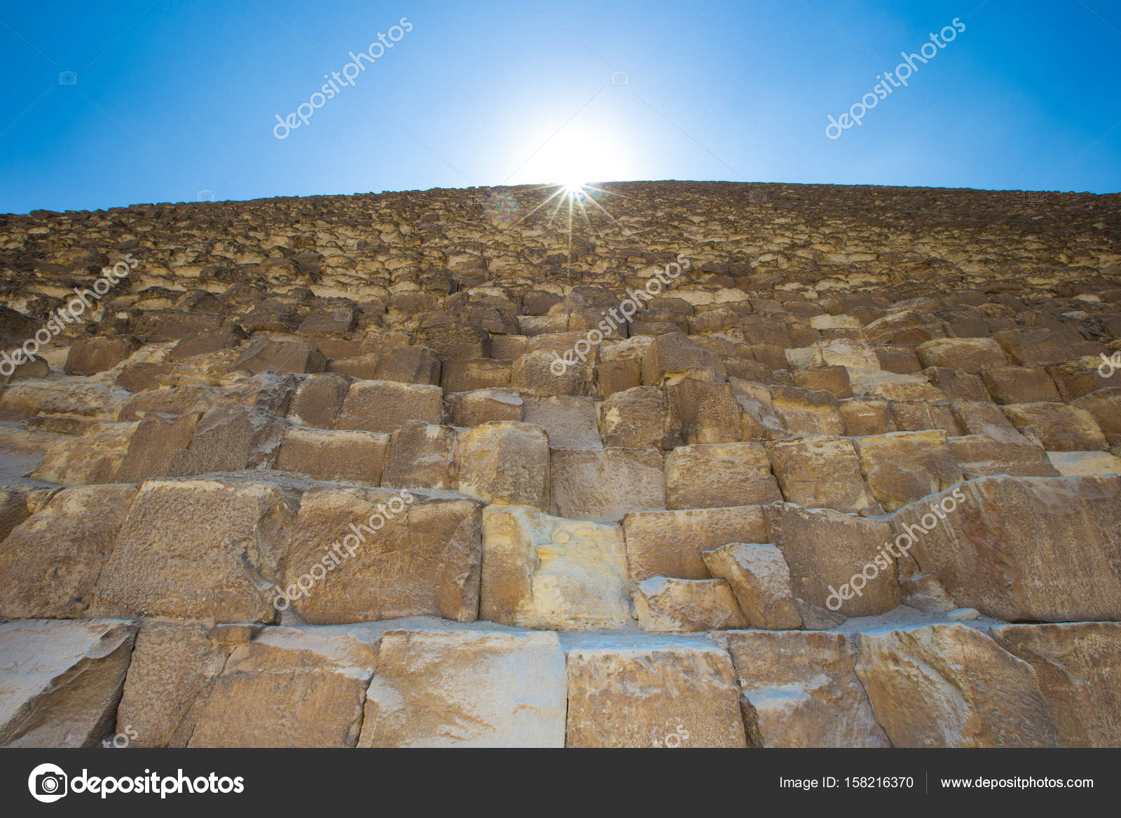 Pyramid with beautiful sky Stock Photo by ©Pakhnyushchyy 158216370