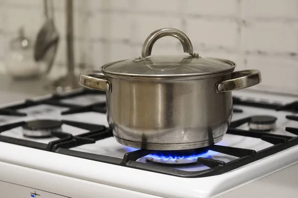 Pot on stove Stock Photos, Royalty Free Pot on stove Images | Depositphotos