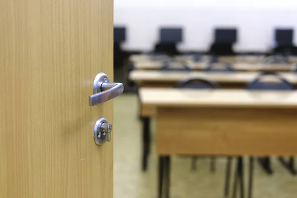 image of a half-open door to school class - Stock Image - Everypixel