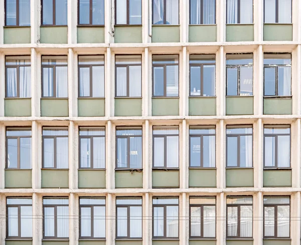 Hospital building covered with windows background - Stock Image ...