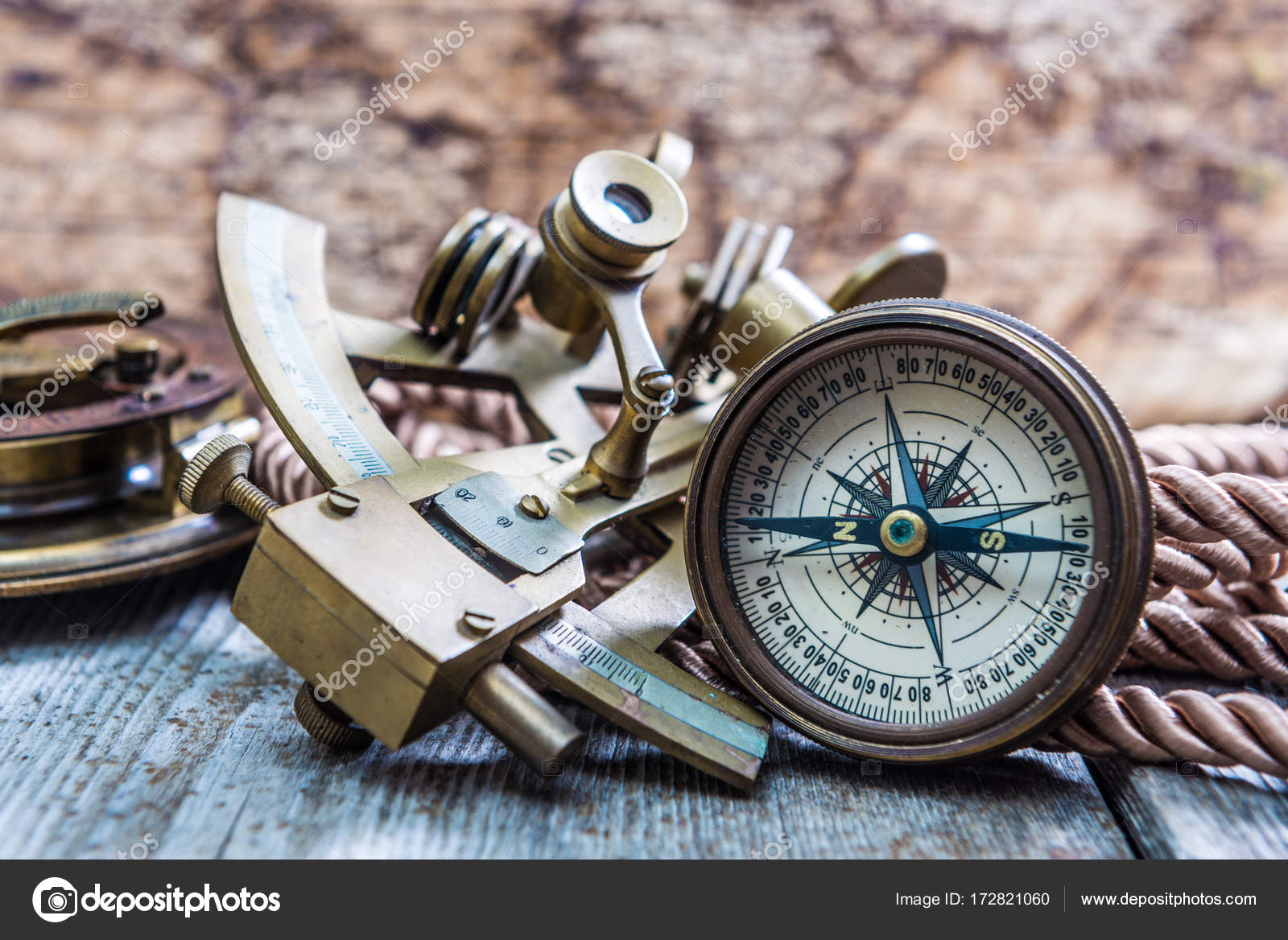 Compass,sextant and spyglass on the timber — Stock Photo © scorpp ...