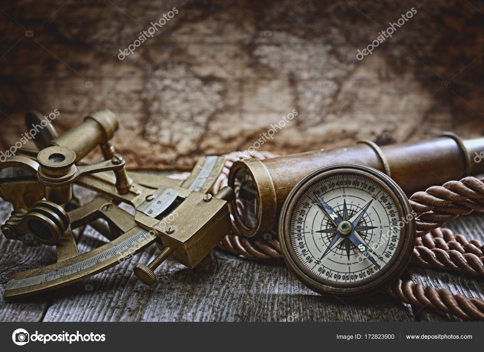 Compass,sextant and spyglass on the timber — Stock Photo © scorpp ...