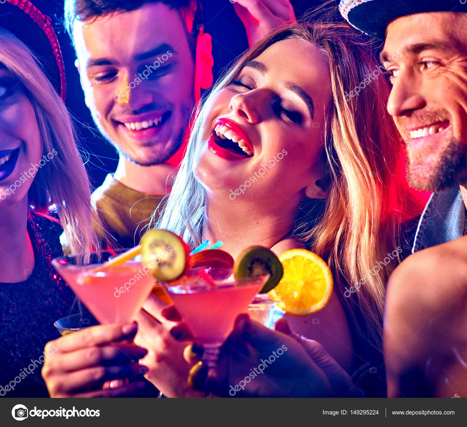 People Partying At A Club And Drinking