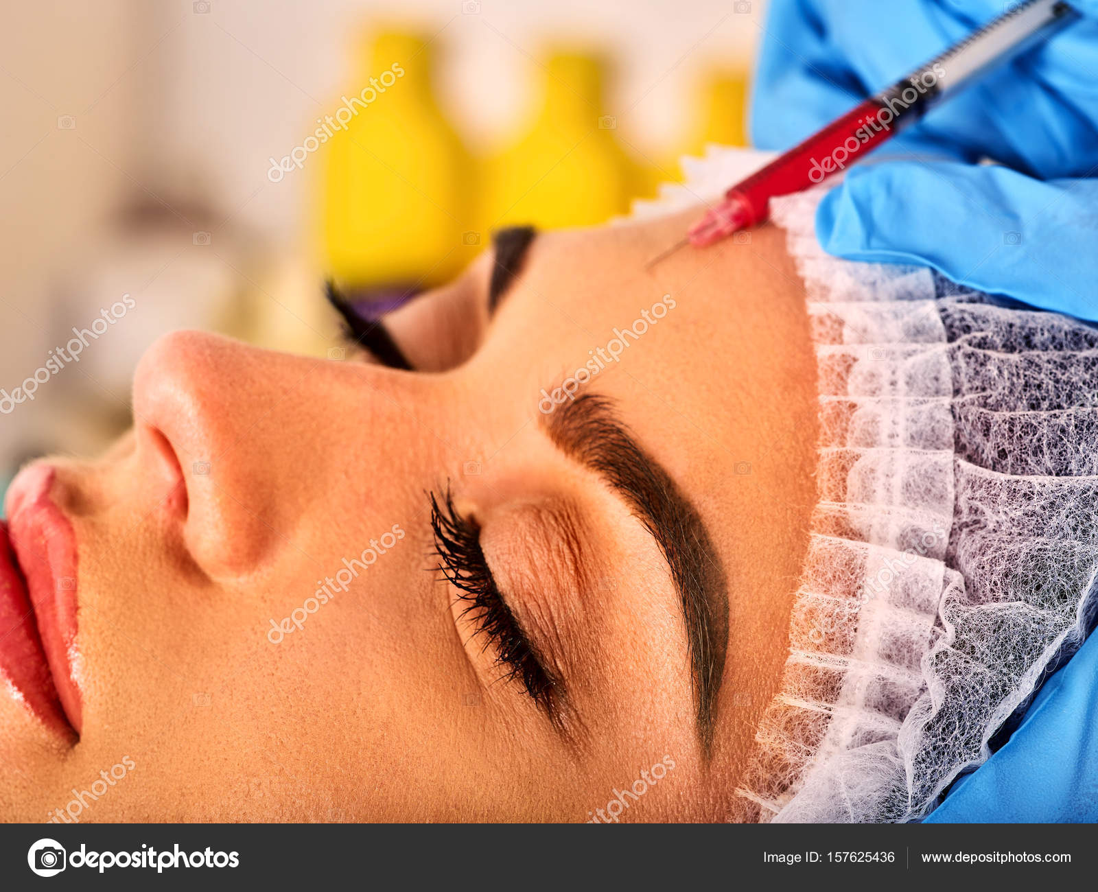 Filler injection for forehead face. Plastic aesthetic facial surgery ...