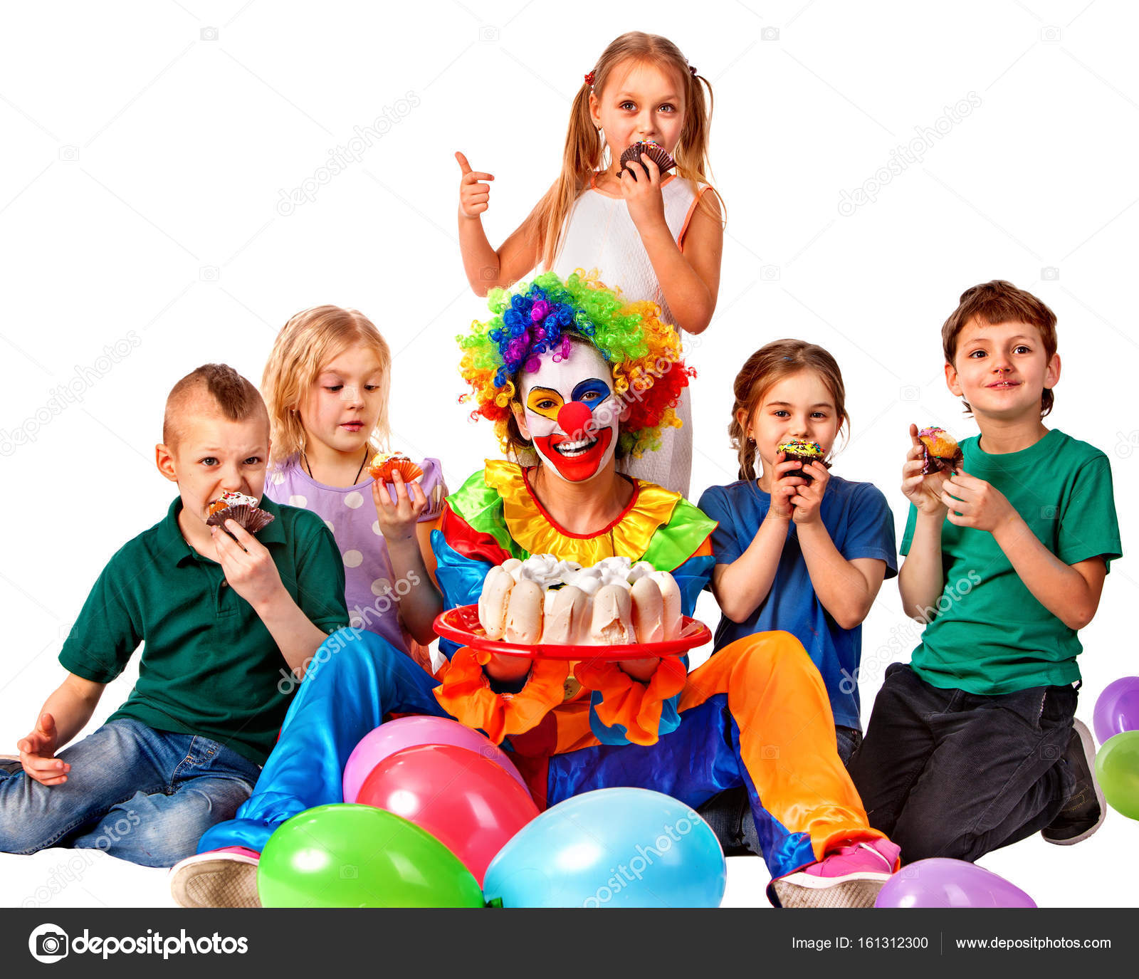Birthday child clown playing with children. Kid holiday cakes ...