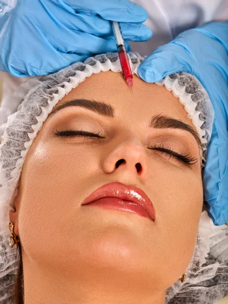 Filler injection for forehead face. Plastic aesthetic facial surgery ...