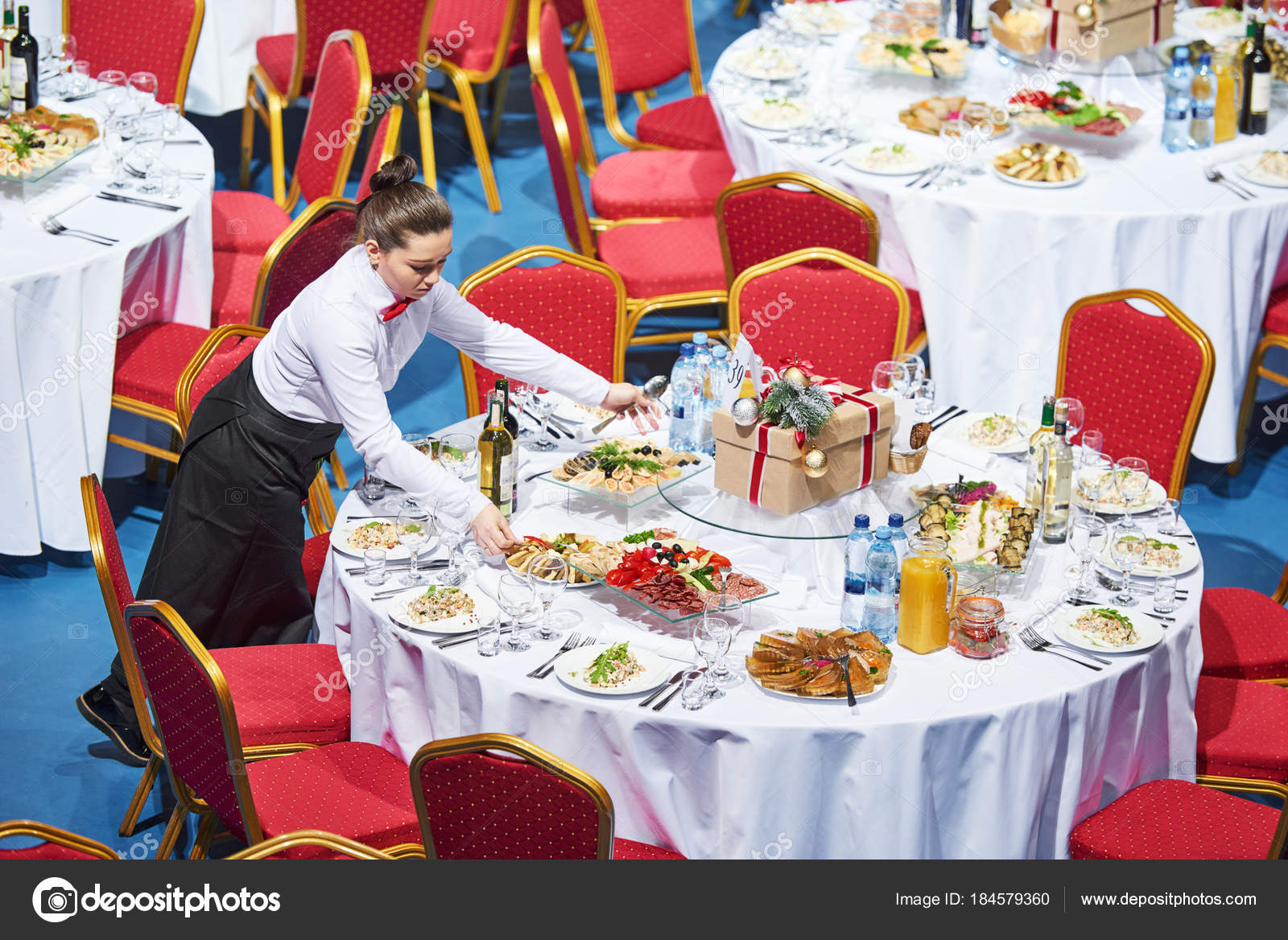Restaurant Waitress At Table