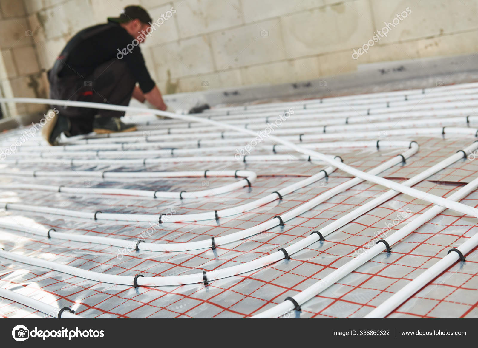 Underfloor heating installation. Warm floor heating system Stock Photo ...