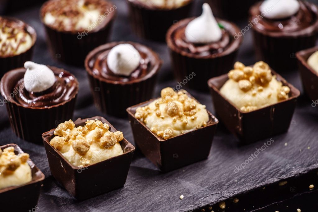 Delicious chocolate sweets — Stock Photo © Shebeko #127674000