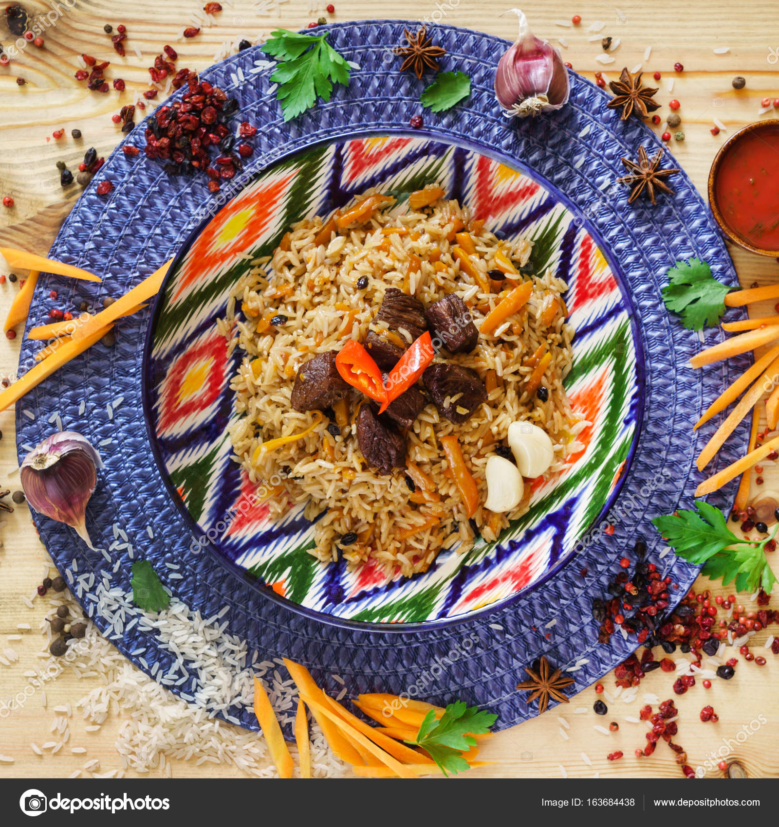 Pilaf with mutton on plate Stock Photo by ©Shebeko 163684438