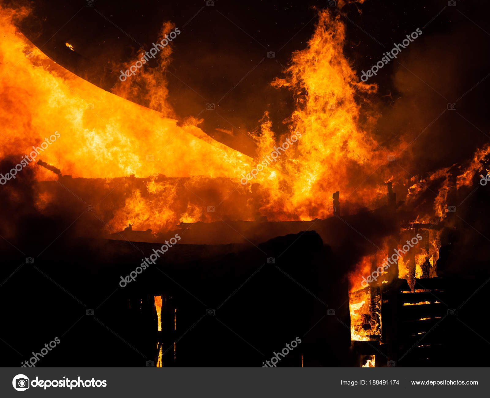 Burning fire flame on wooden house roof — Stock Photo © ia__64 #188491174