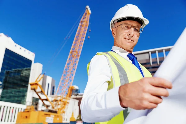 Engineer builder at construction site — Stock Photo © SergeyNivens ...