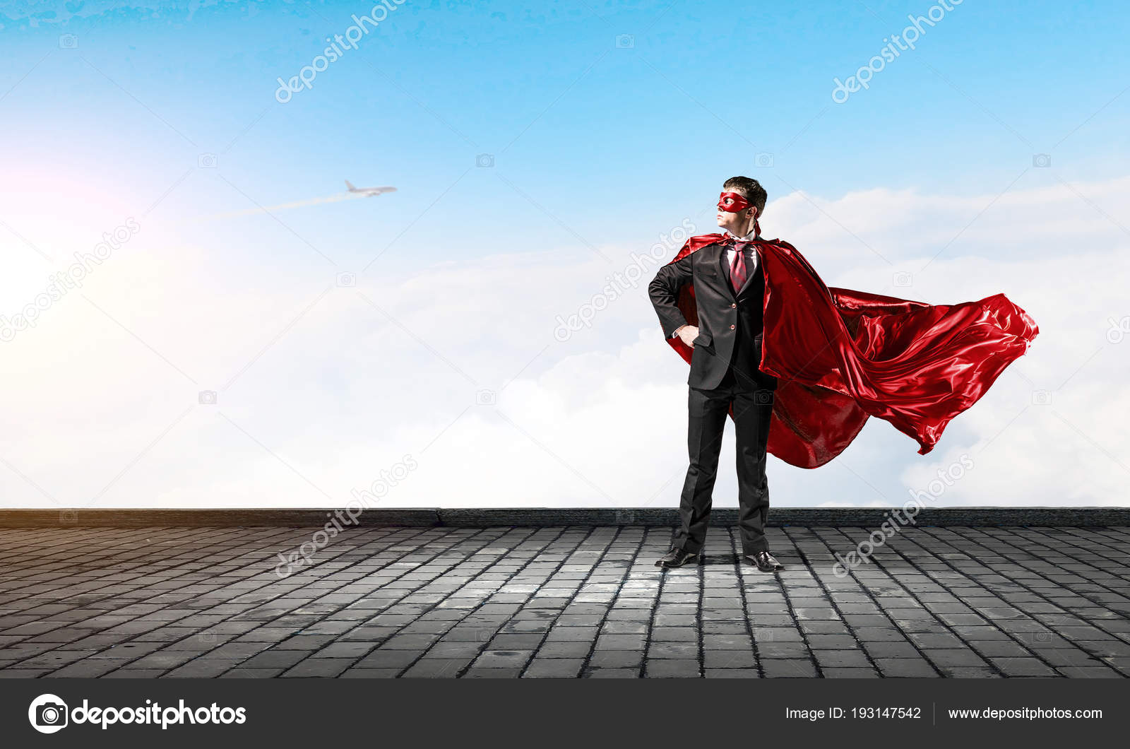 Strong and powerful as super hero . Mixed media Stock Photo by ...