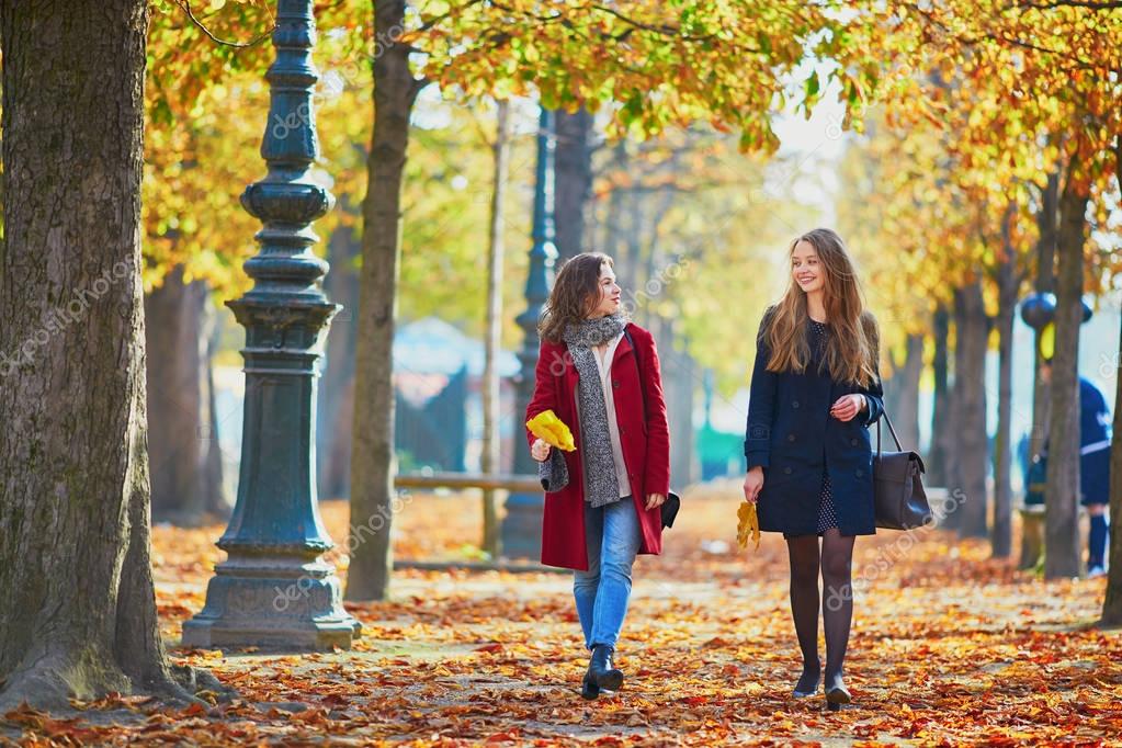 Two young girls on a sunny fall day Stock Photo by ©encrier 130318804