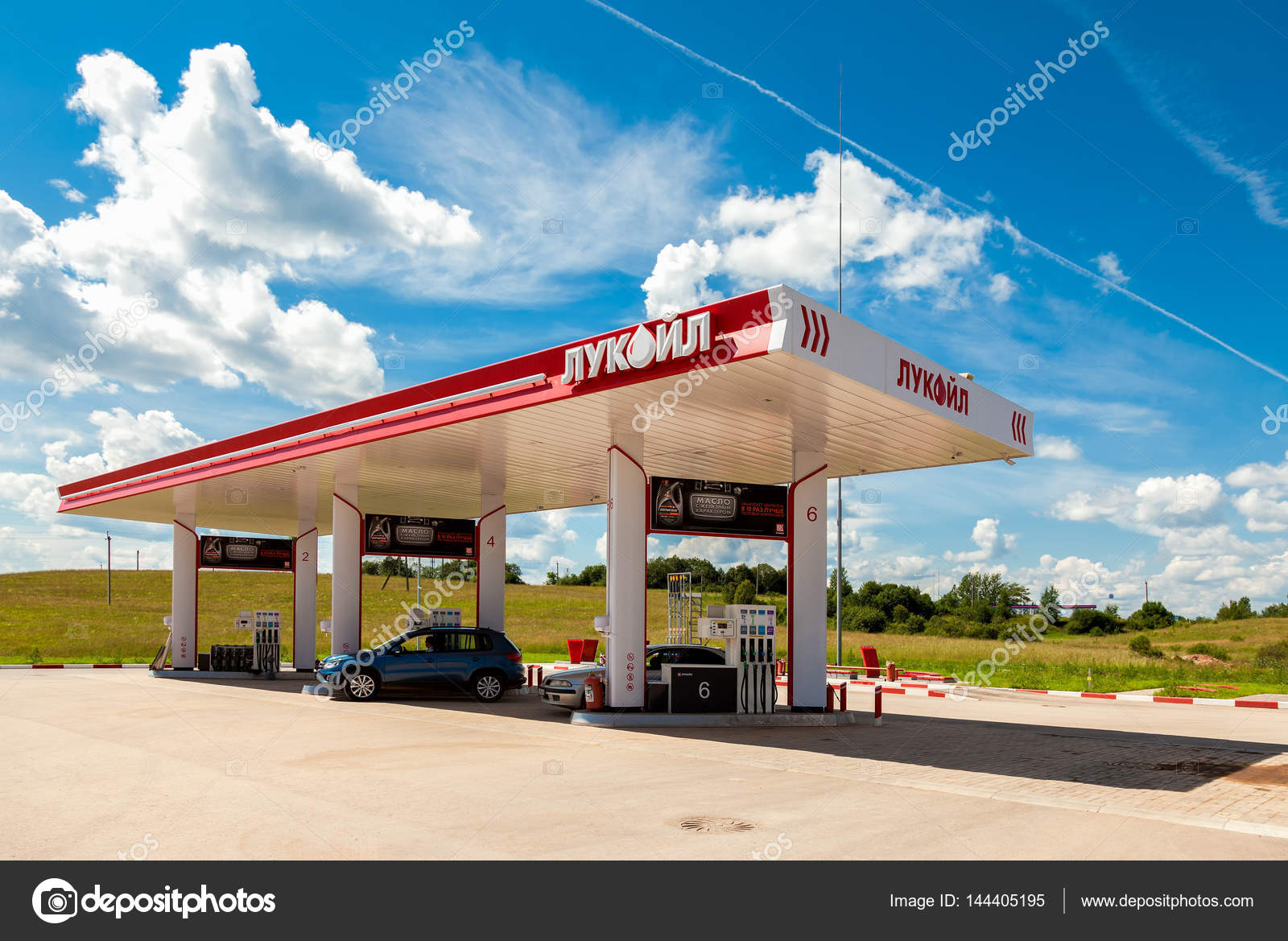 Lukoil gas station with fueling cars — Stock Editorial Photo © blinow61 ...