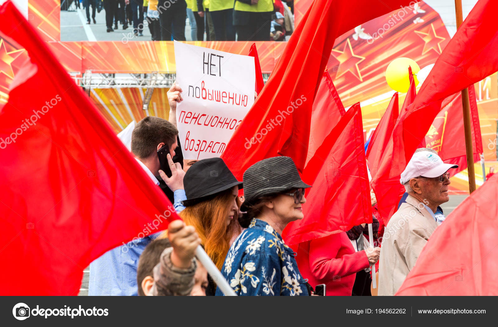 People with red flags during selebration International Labor Day ...