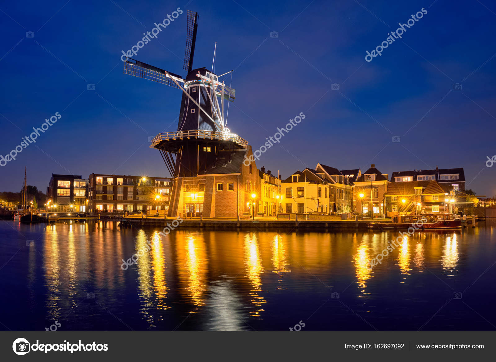 Harlem landmark windmill De Adriaan on Spaarne river. Harlem, — Stock ...