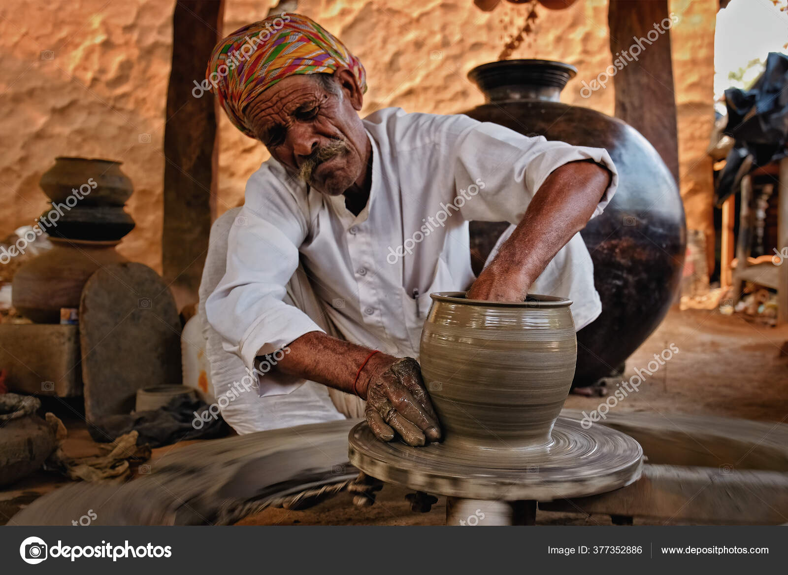 Indian potter at work. Handwork craft from Shilpagram, Udaipur ...