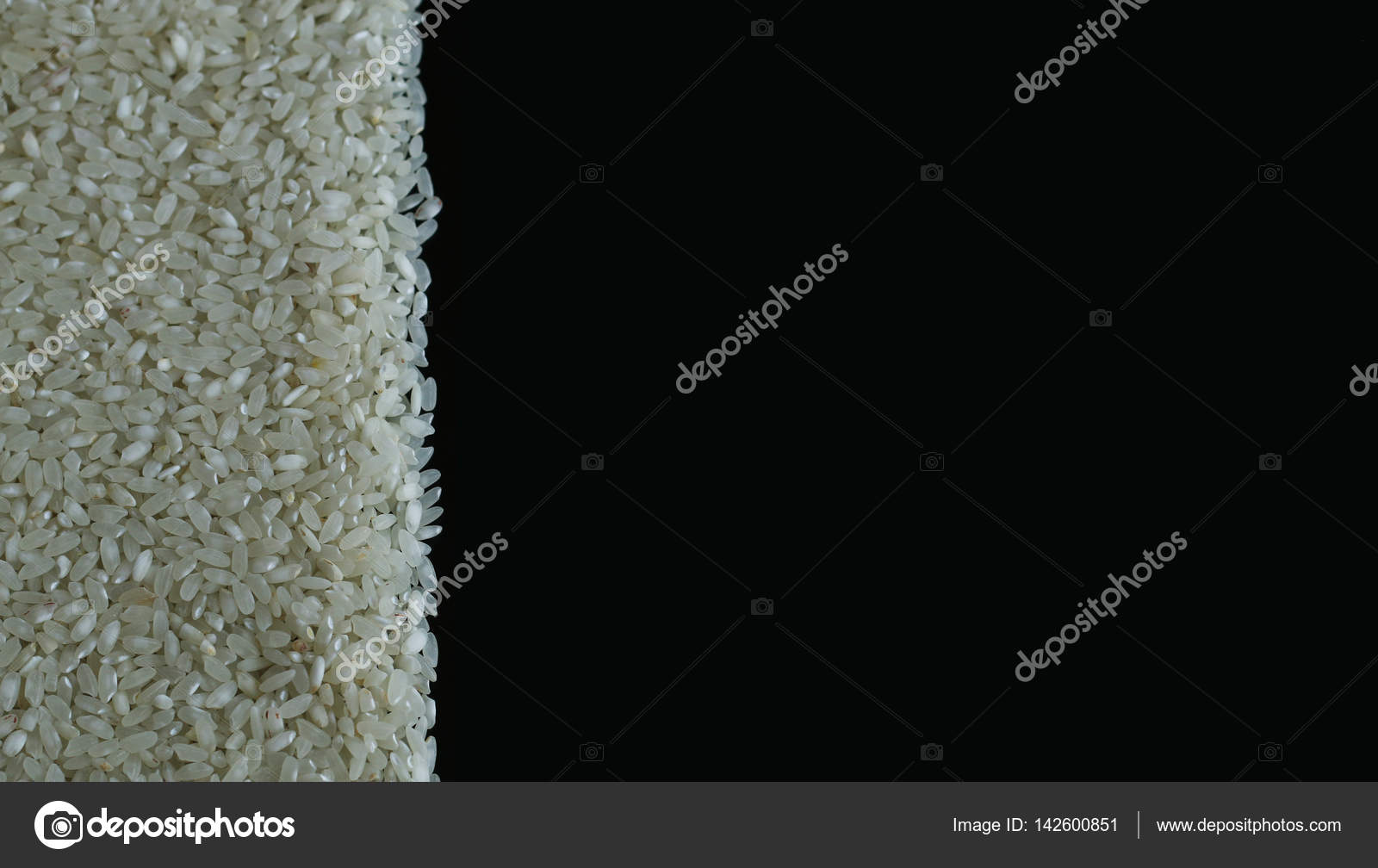 Rice left black background Stock Photo by ©romvo79 142600851