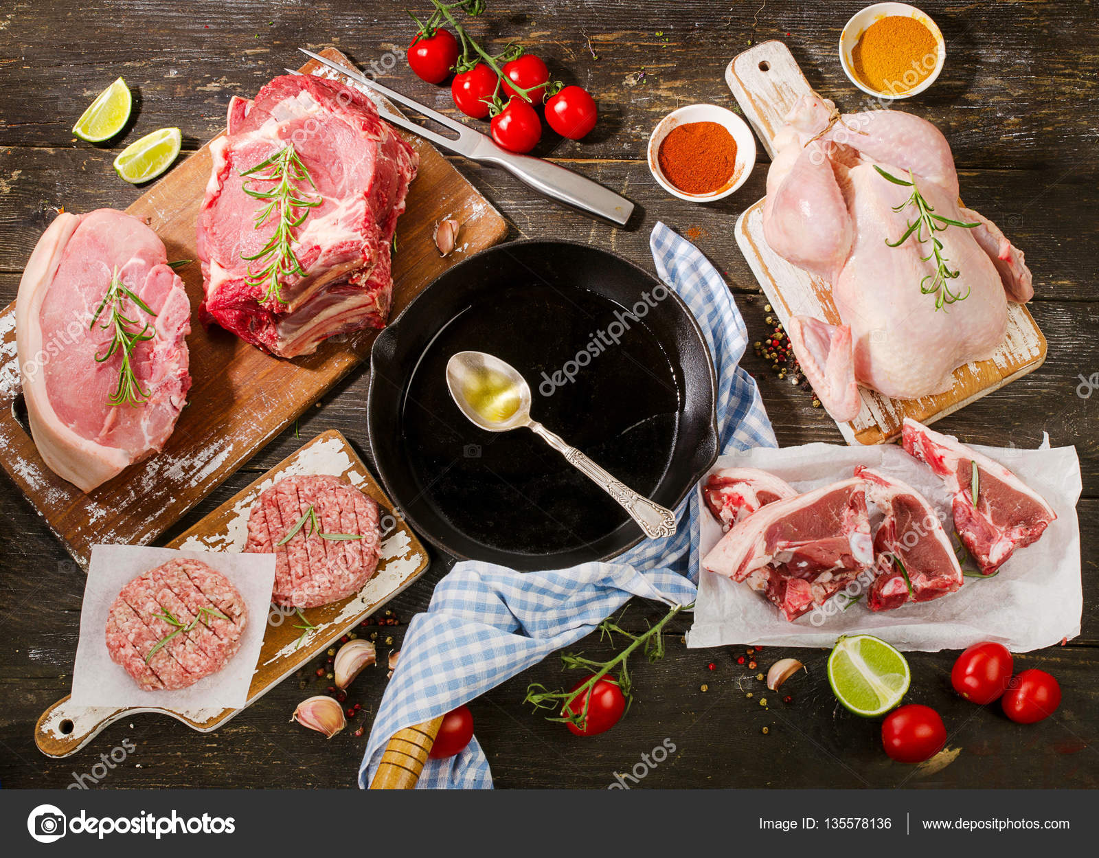Different types of raw meat with seasonings and iron pan Stock Photo by ...