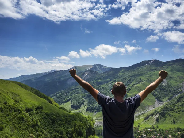 Man standing in nature with arms lifted up — Stock Photo © Balazs #3565752