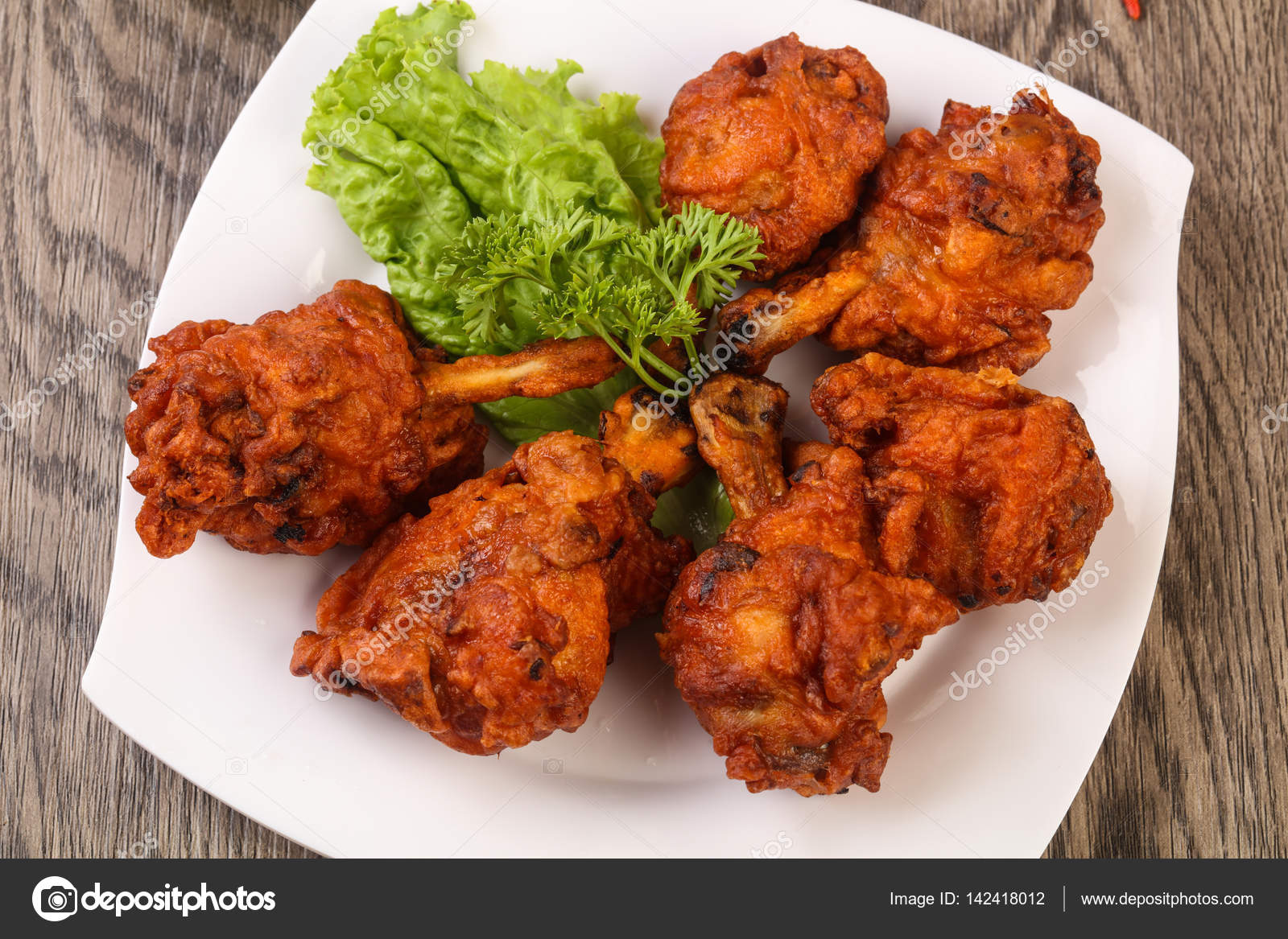 Indian traditional Chicken lollipops Stock Photo by ©AndreySt 142418012