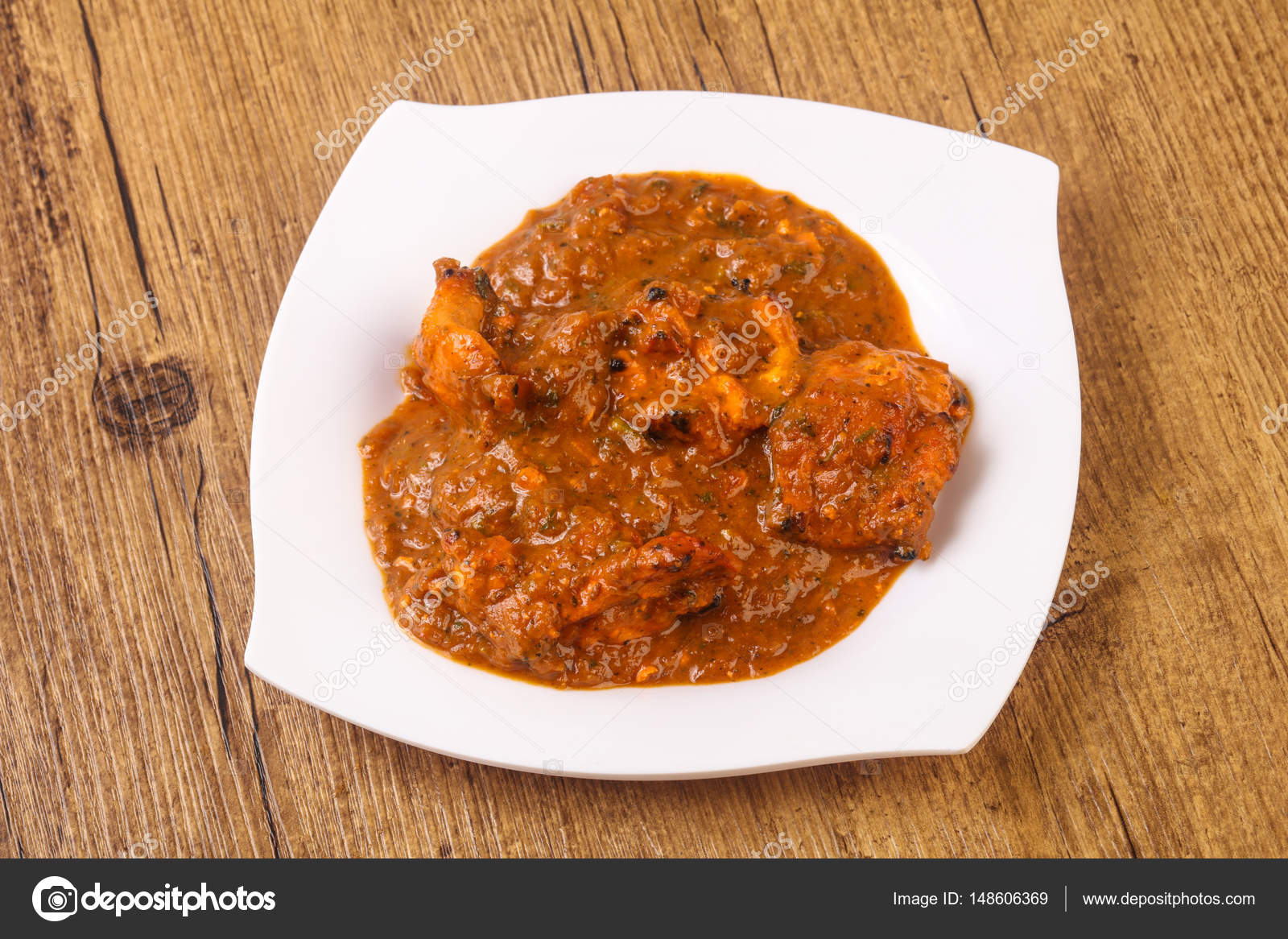 Indian traditional Masala chicken — Stock Photo © AndreySt #148606369