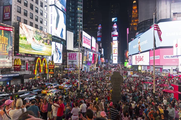 Tourists in Times Square at night. – Stock Editorial Photo © jovannig ...