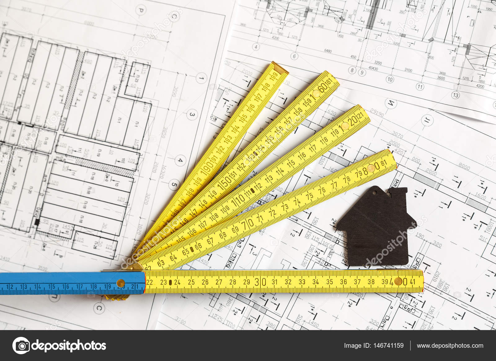 Architecht blueprints, ruler and a house — Stock Photo © gerasimov ...
