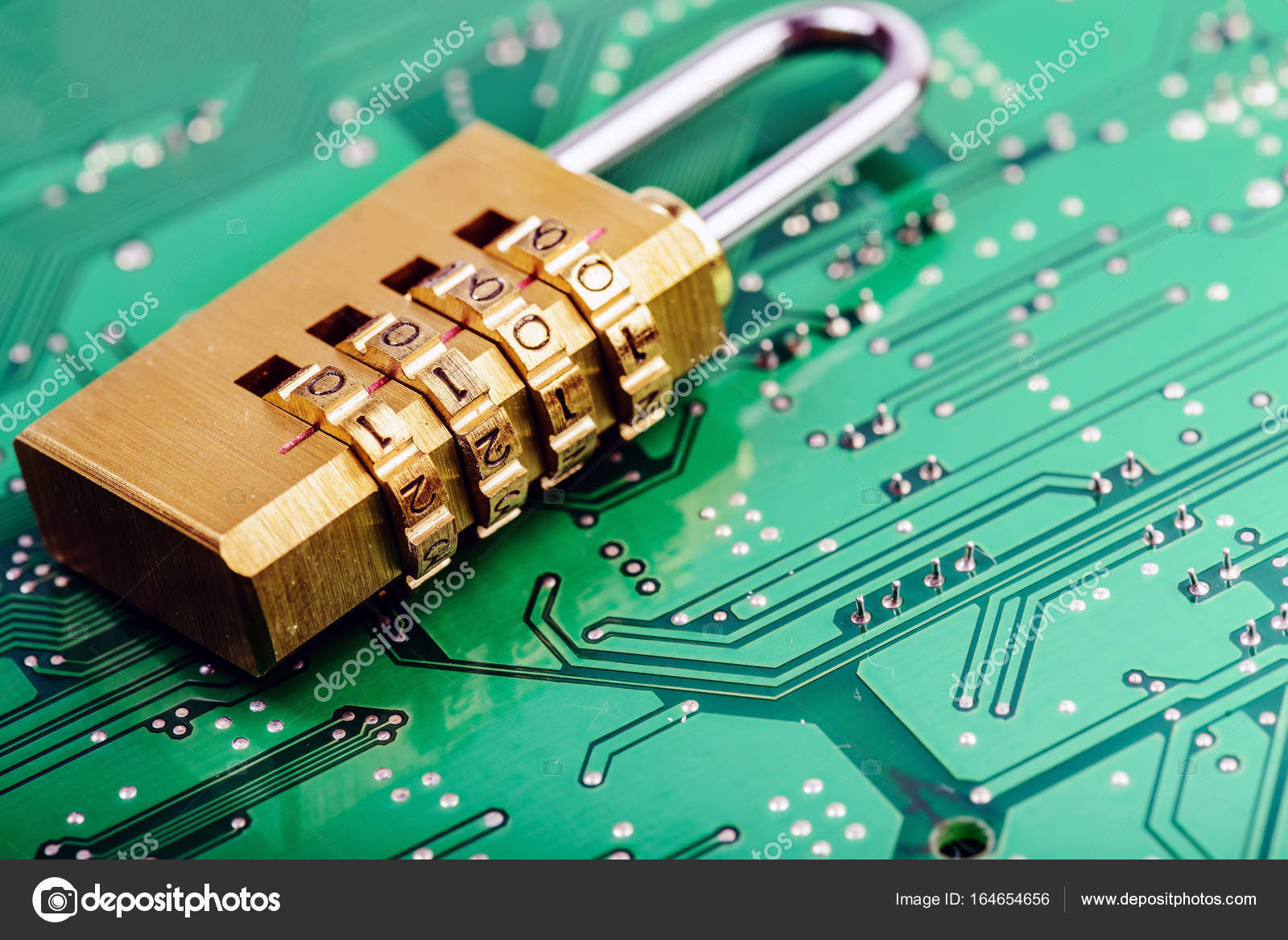Lock on the computer motherboard Stock Photo by ©Paulpaladin 164654656