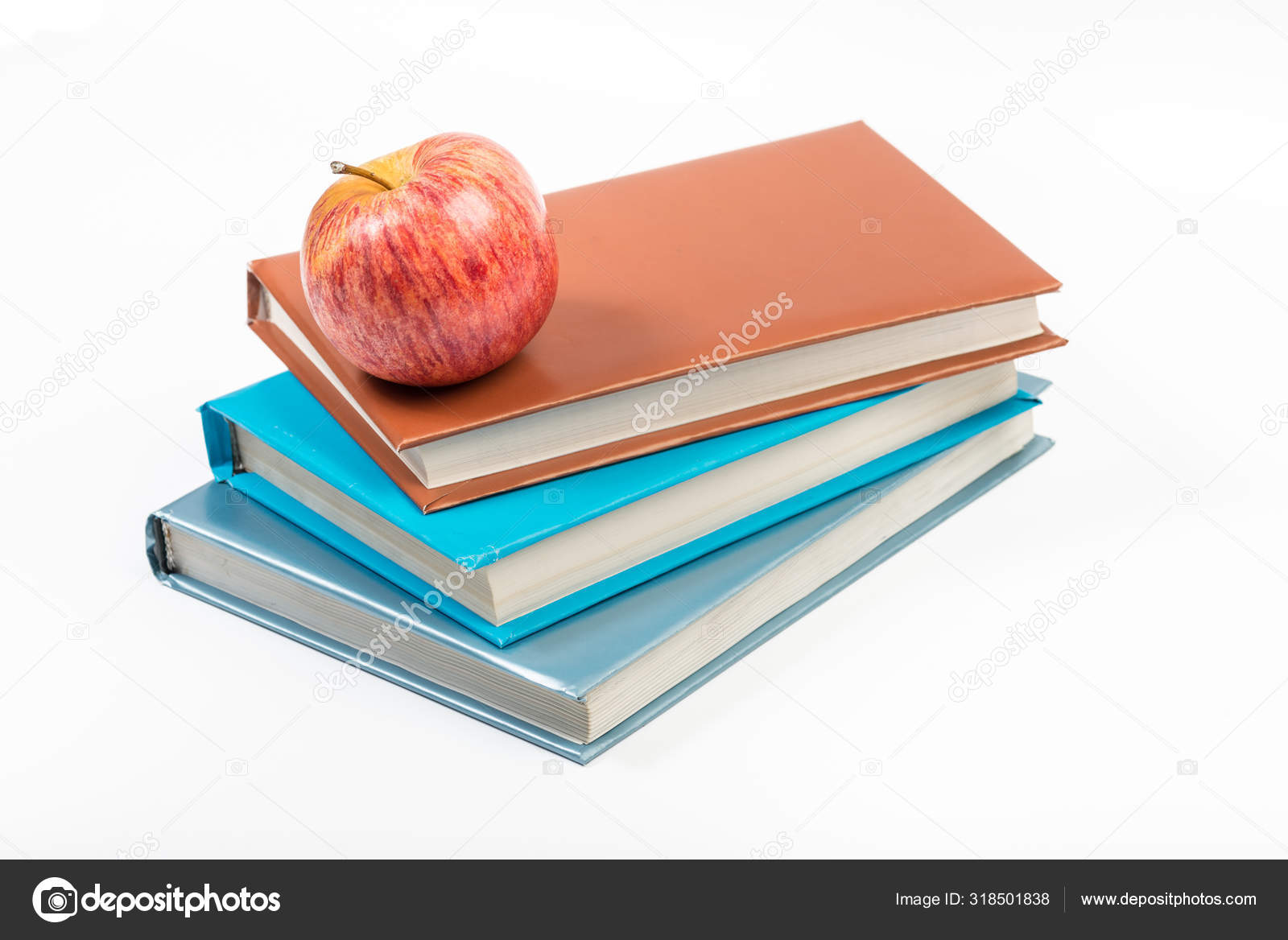 Stack Of School Books With Apple