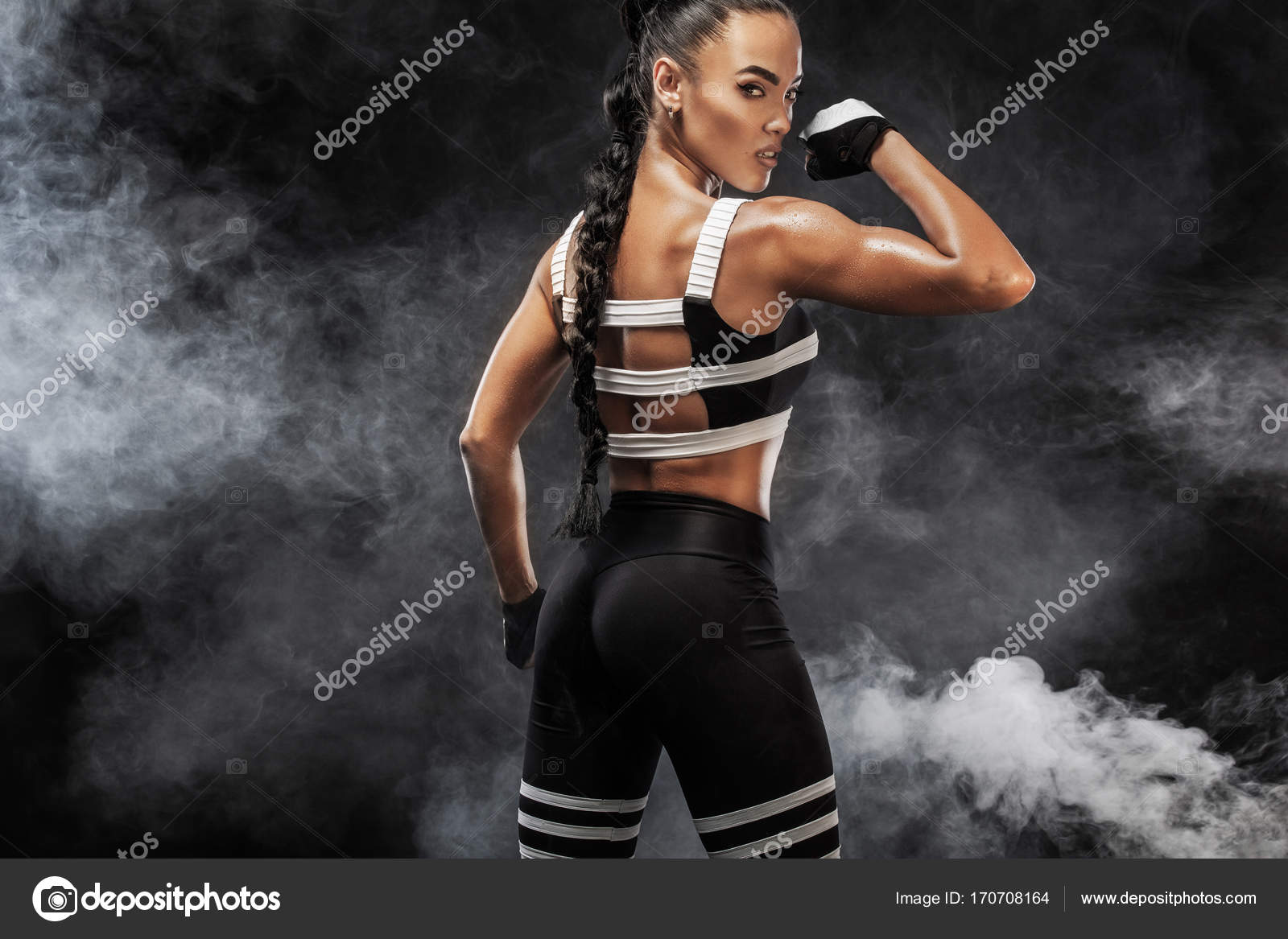 Sporty beautiful afro-american model, woman in sportwear makes fitness ...