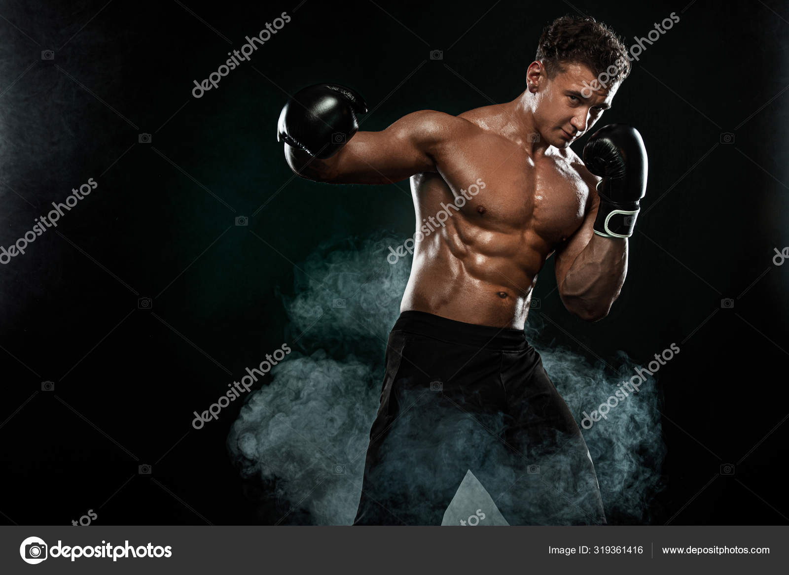 Boxer, man fighting or posing in gloves on black background. Fitness ...