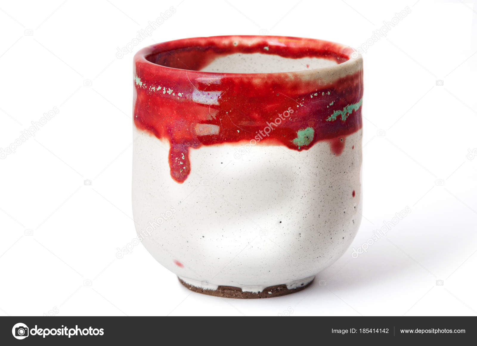 Red and white raku cup Stock Photo by ©velkol 185414142