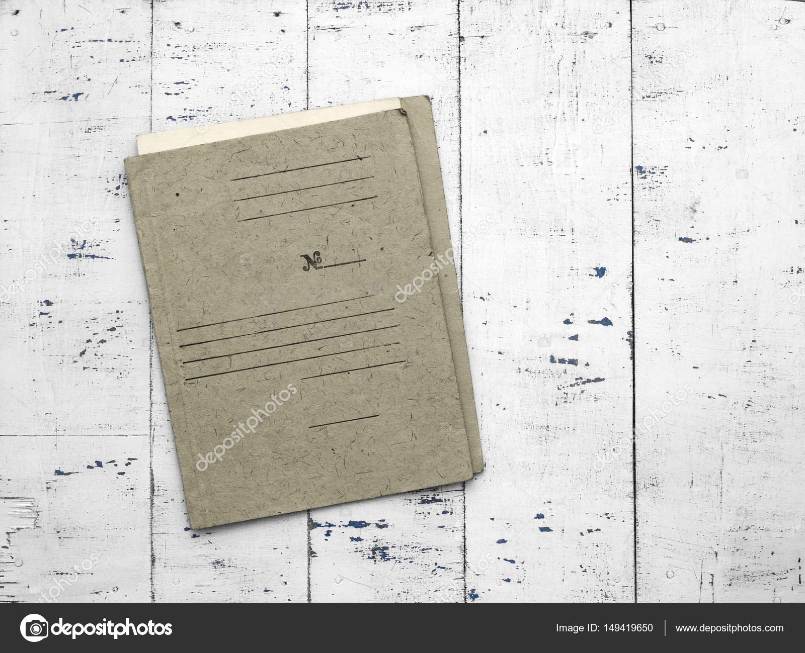 Retro folder on old table Stock Photo by ©avlntn 149419650