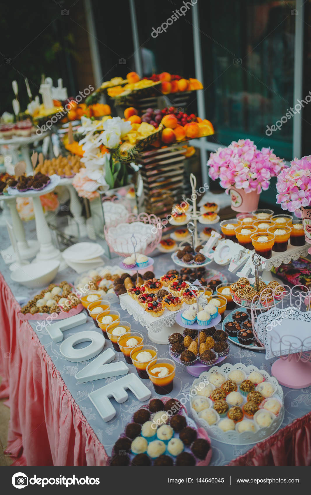 Beautiful sweets on buffet table with decorations — Stock Photo ...