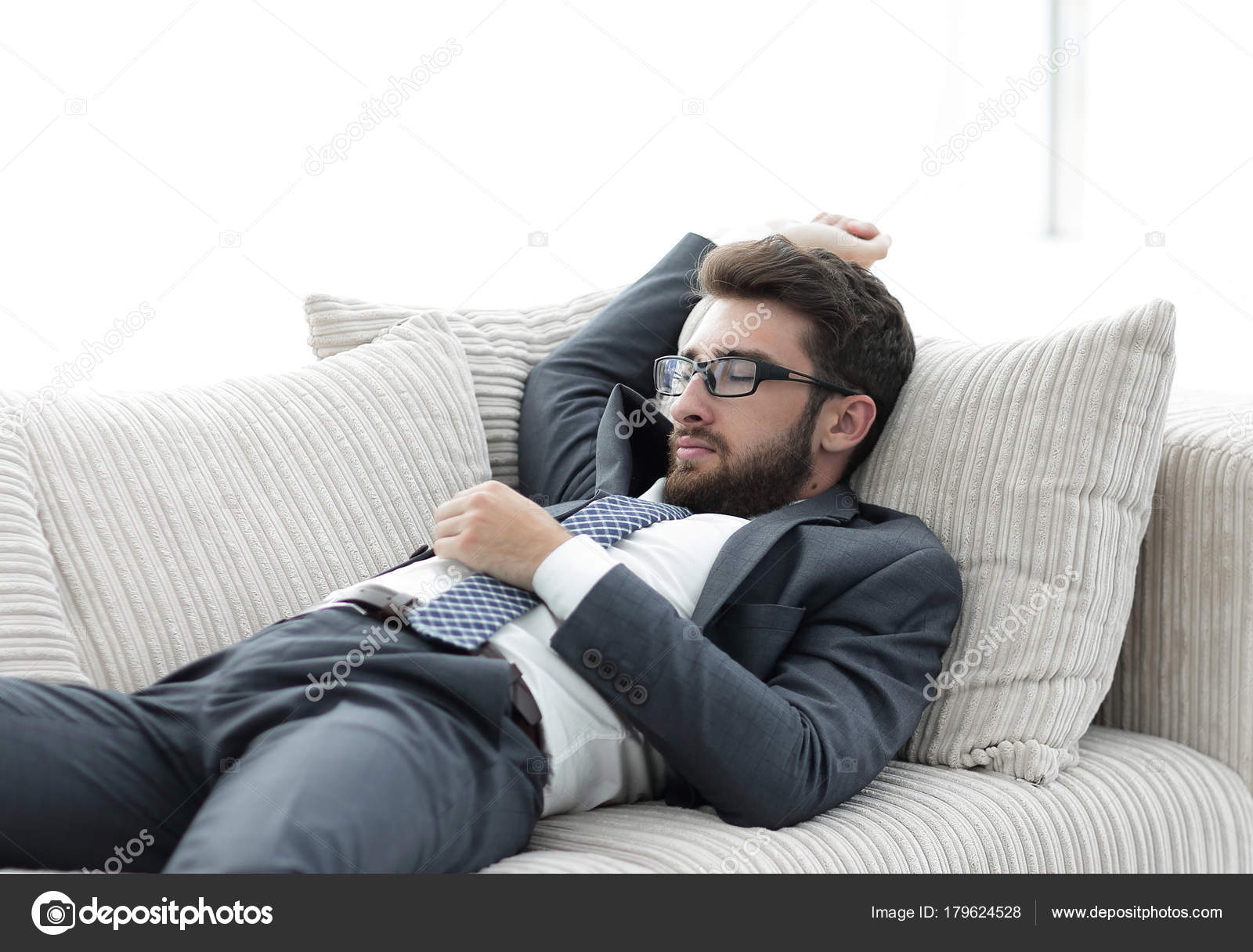 Tired businesswoman relaxing on the couch. — Stock Photo © depositedhar ... Tired businesswoman relaxing on the couch. — Stock Photo © depositedhar ...
