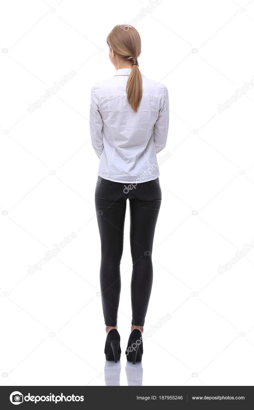 Rear view. in full growth.portrait of a confident young woman. Stock ...