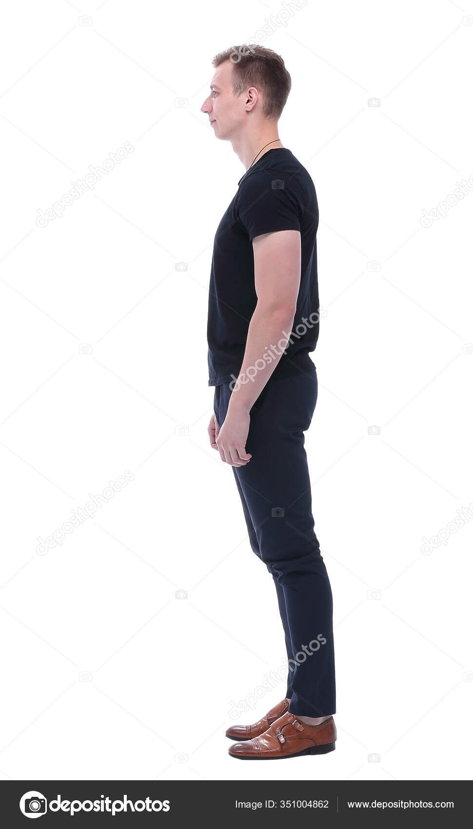 Side view. handsome guy looking at a white wall Stock Photo by ...