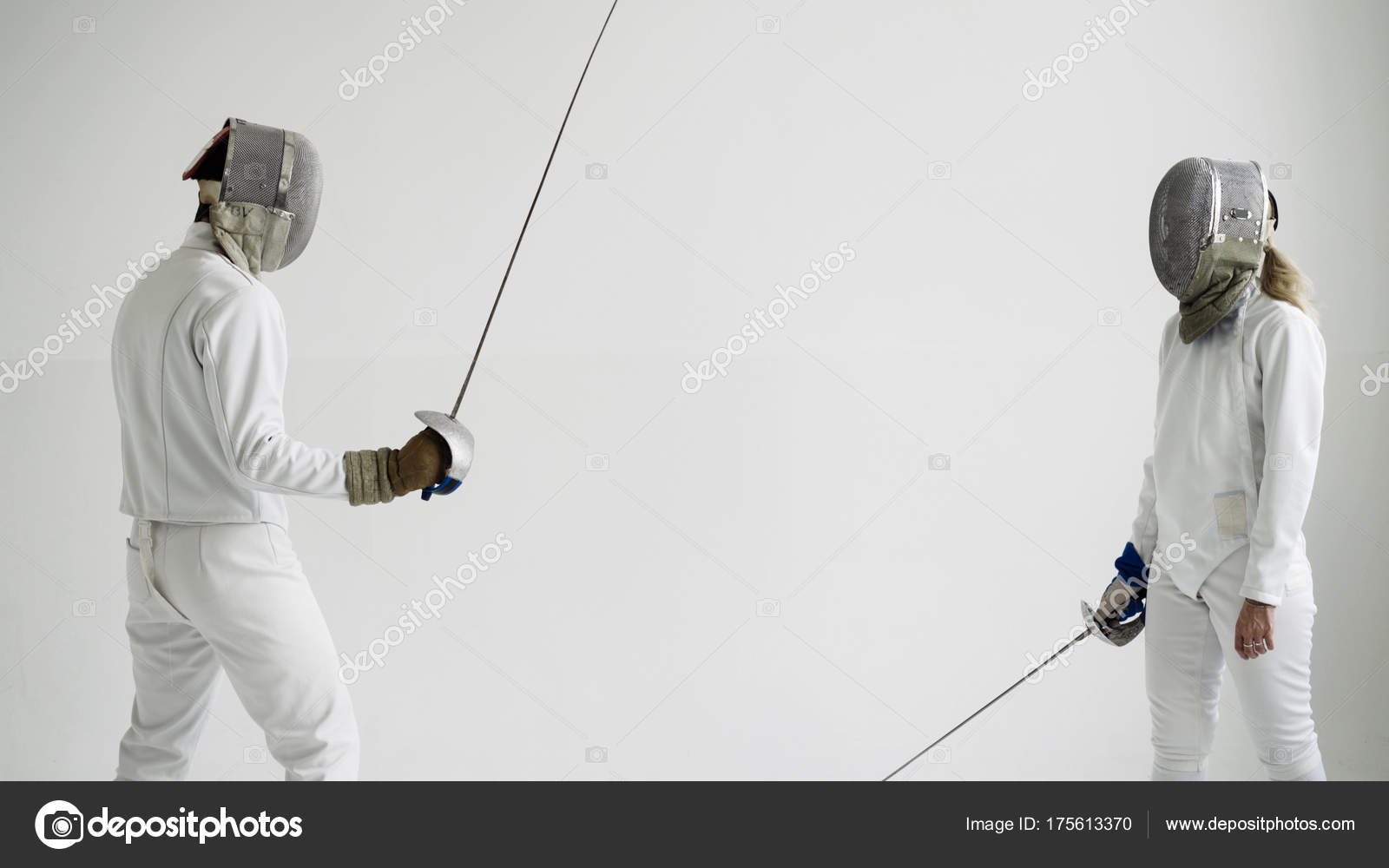 Two fencers have fencing training on white background Stock Photo by ...