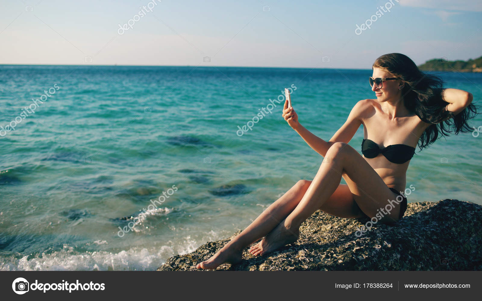 Beautiful Woman Taking Selfie Using Phone On Beach Smiling And Enjoying