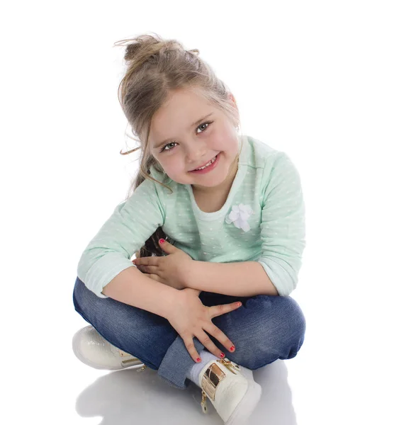 Beautiful blonde little girl — Stock Photo © arkusha #150396998