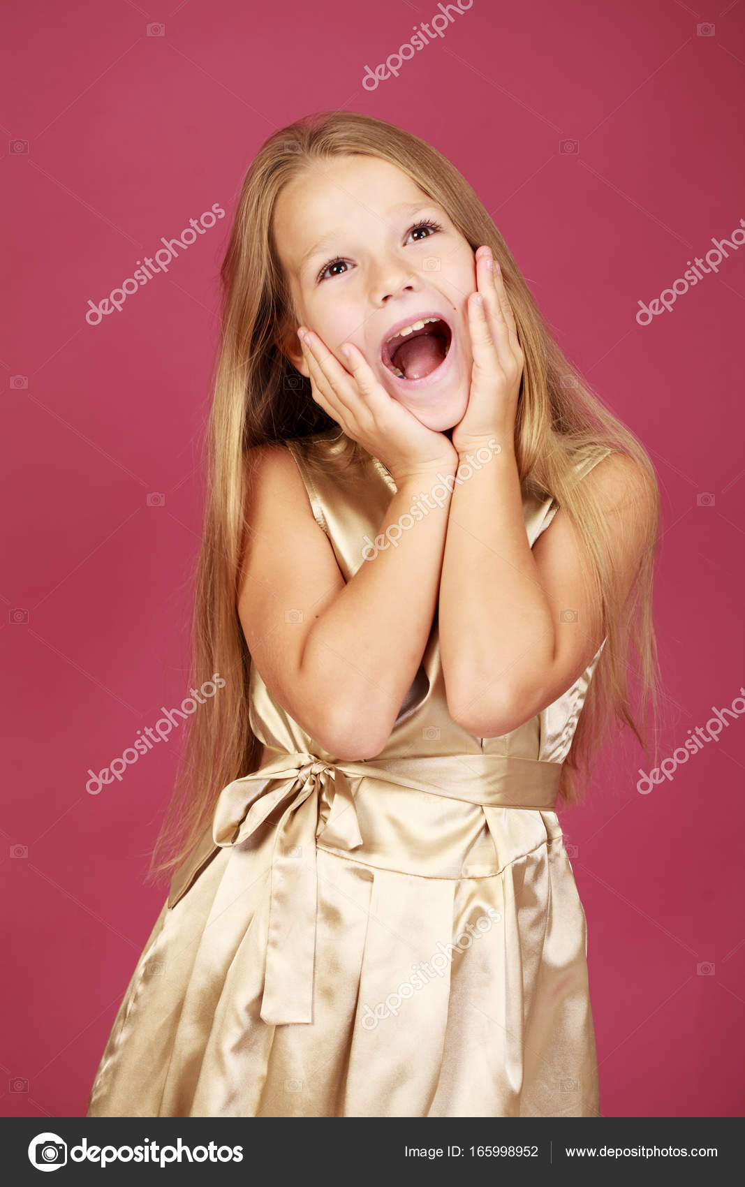 Beautiful blonde little girl Stock Photo by ©arkusha 165998952