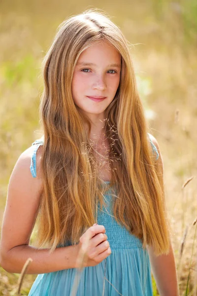 Portrait of a beautiful young blonde little girl — Stock Photo © arkusha #119716134