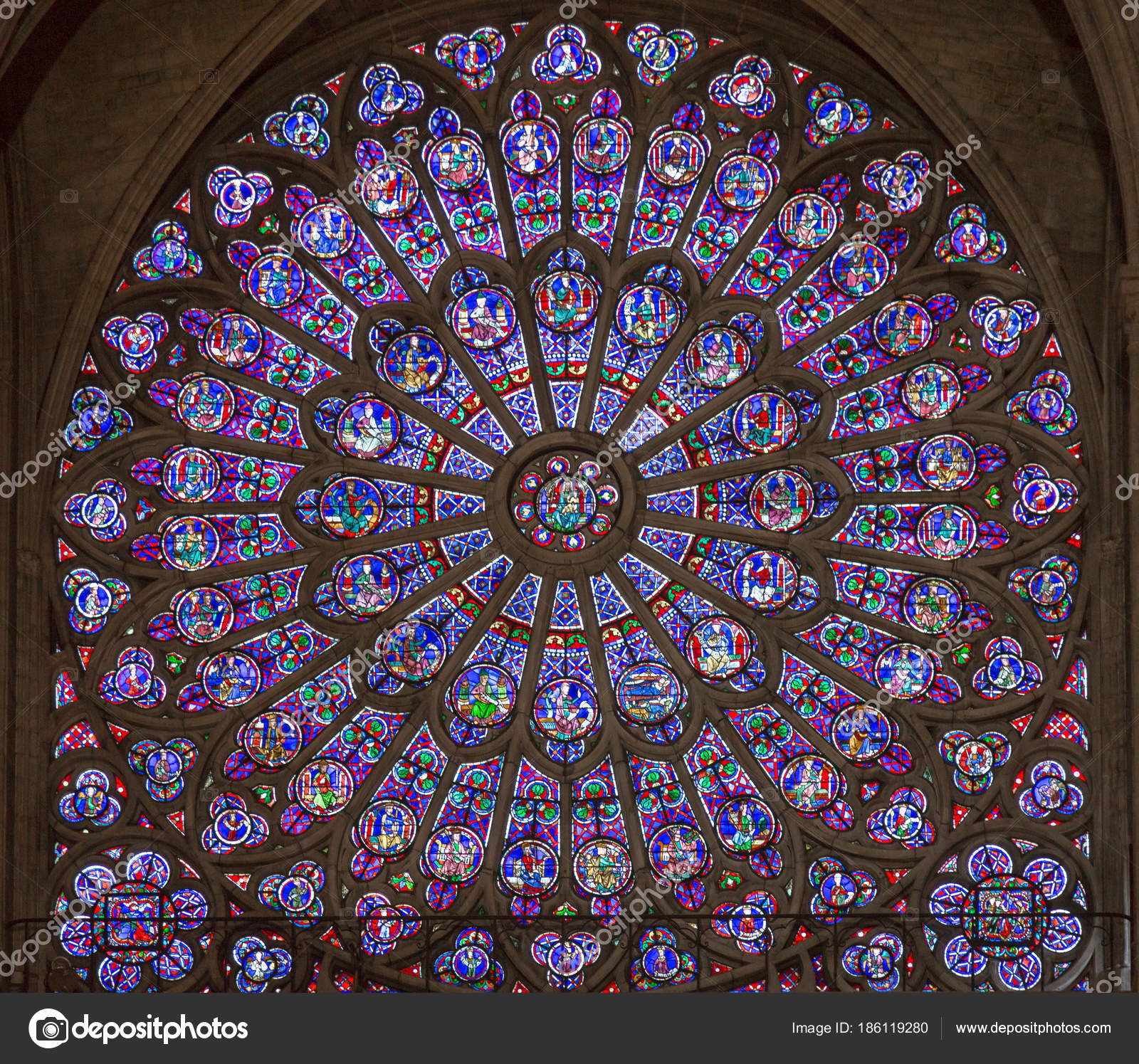 Stained glass window in Notre dame cathedral, Paris Stock Photo by ...